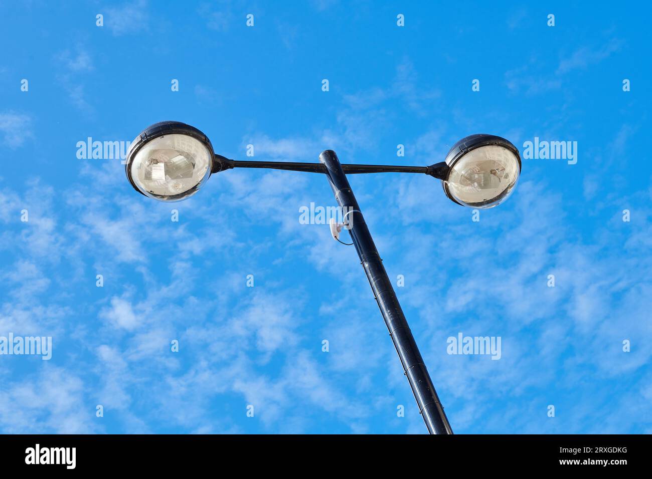 A duo of lamps on a lamp post at the market place in Cambridge, England ...