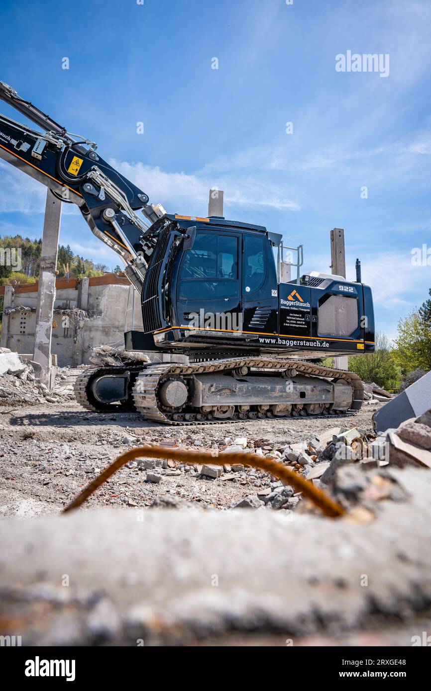 Black Liebherr crawler excavator recycling on demolition site Stock ...