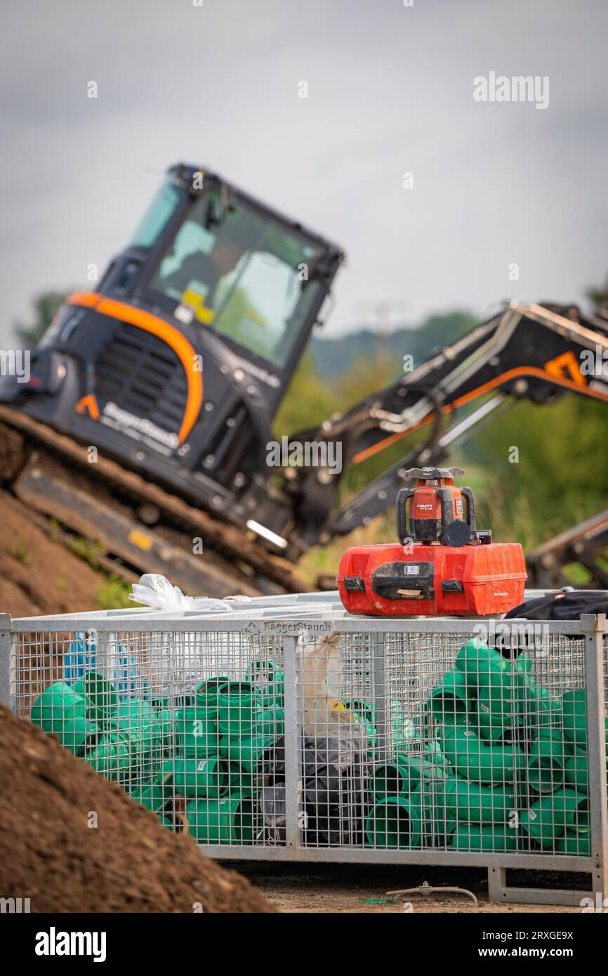 Black Yanmar Mini tracked excavator during earthworks for house ...