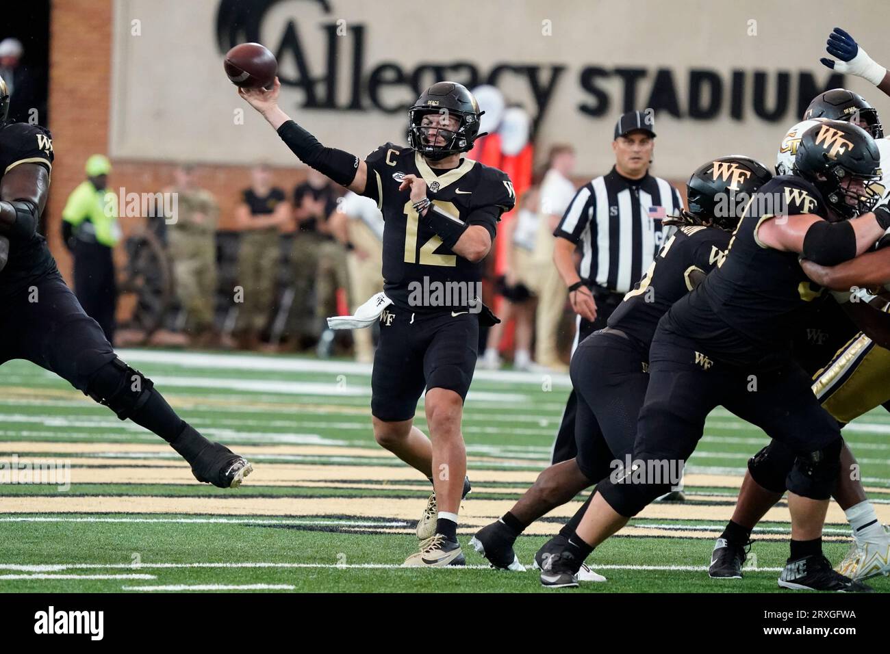Wake Forest quarterback Mitch Griffis (12) looks to pass against ...