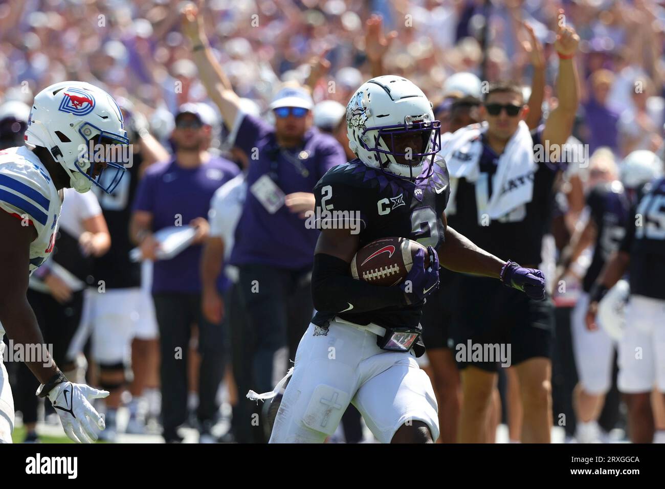 TCU cornerback Josh Newton (2) runs the ball after an interception ...
