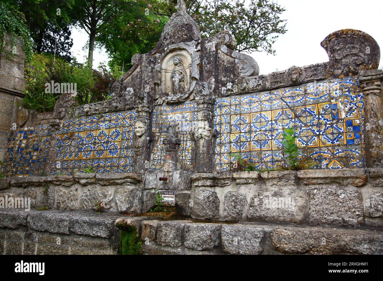 Beautiful tiled water fountains and basins in the riverside town of ...