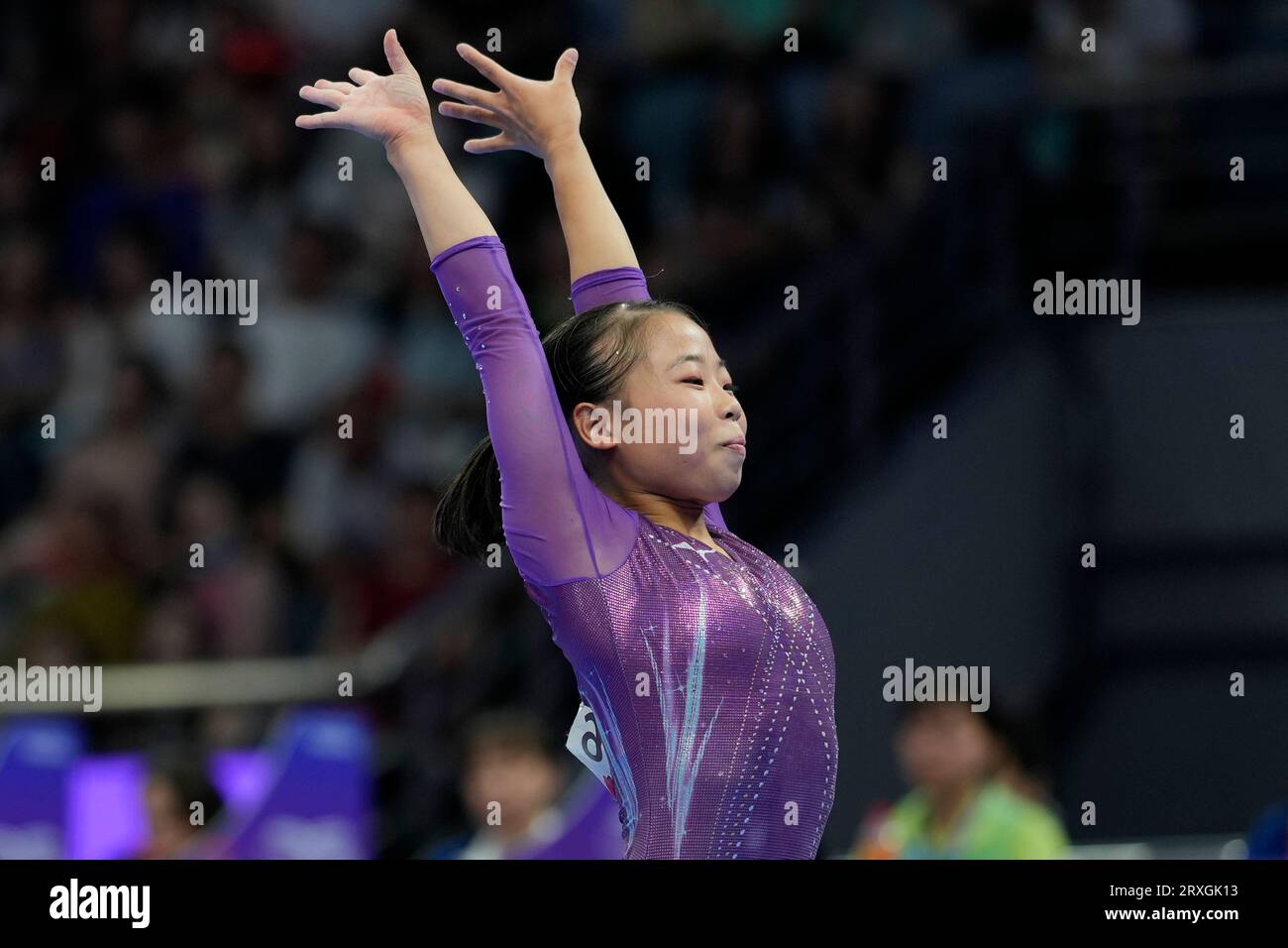Misaki Masui of Japan competes on the balance beam at the women's team ...