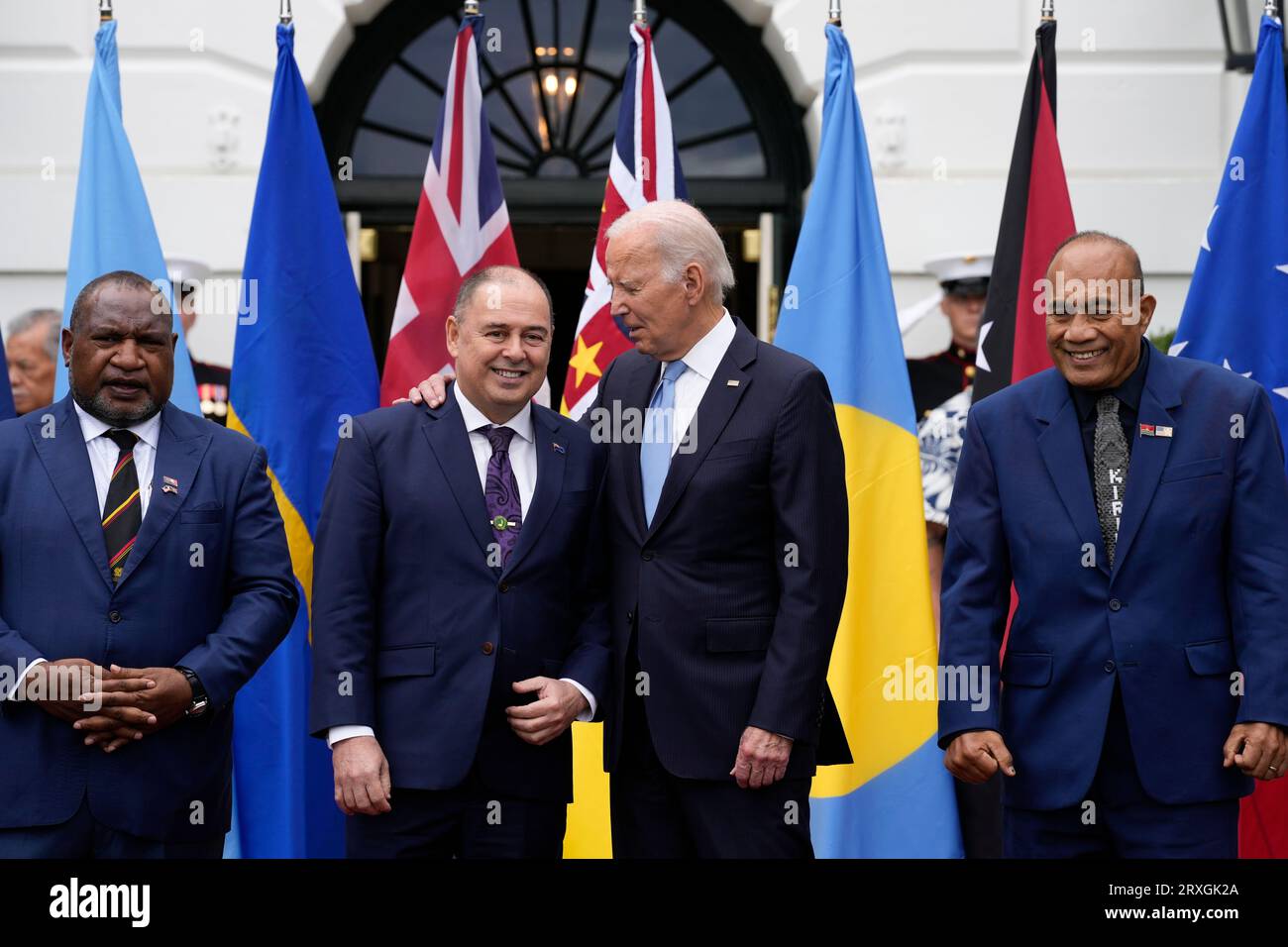 President Joe Biden talks with Cook Islands Prime Minister Mark Brown ...