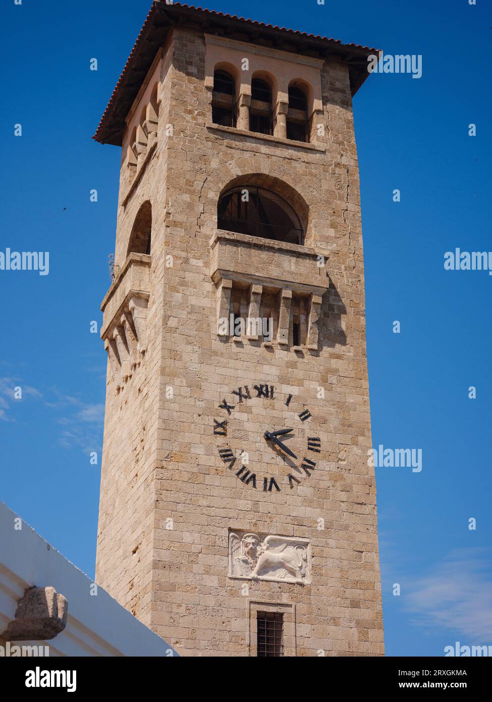 Travel to Greece, Mediterranean islands Rhodes. medieval tower clock ...