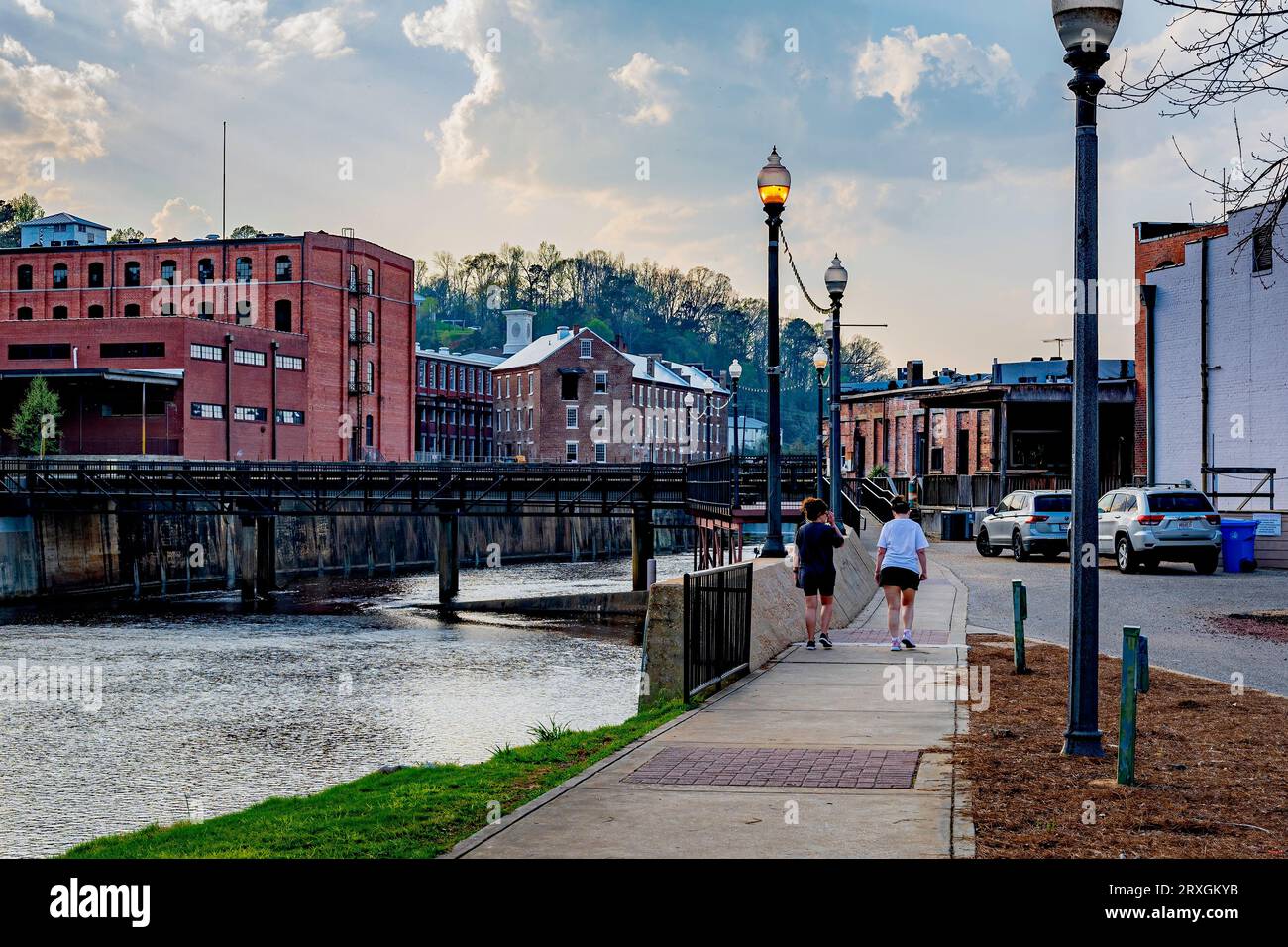 Prattville, Alabama, USA-March 7, 2023: Two women walk along the ...