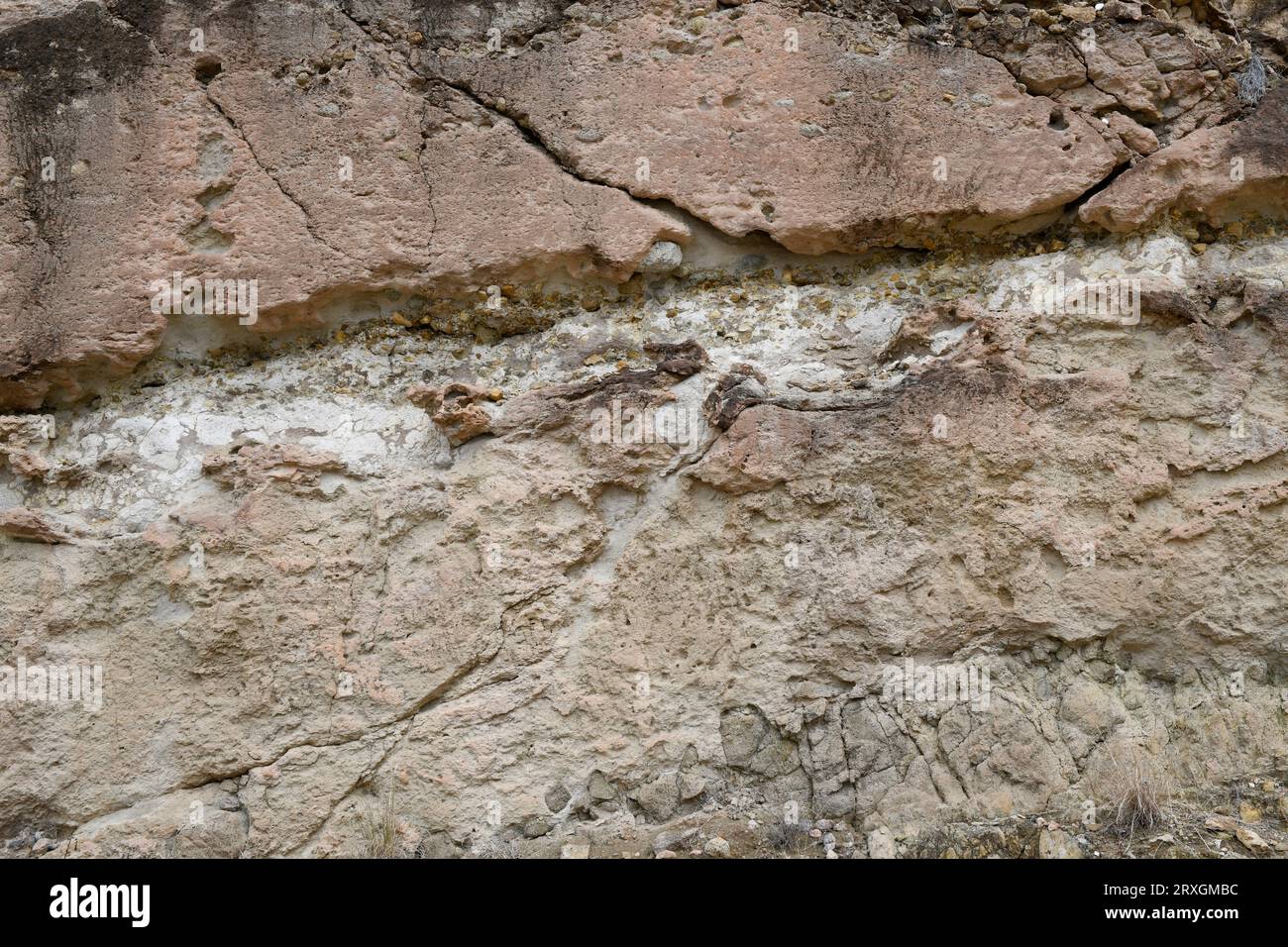 Slope with weathered andesite (base), volcanic breccia and pyroclastic ...