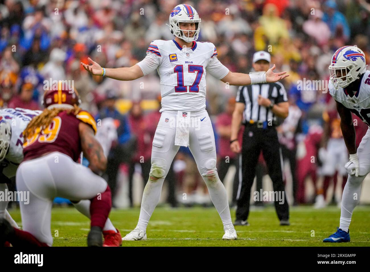 Buffalo Bills quarterback Josh Allen (17) gestures towards the sideline ...