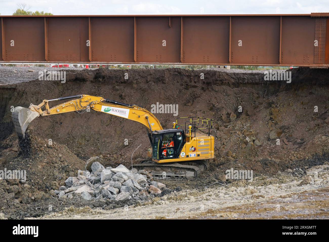 HS2 contractors excavate an area below a newly replaced section of the ...