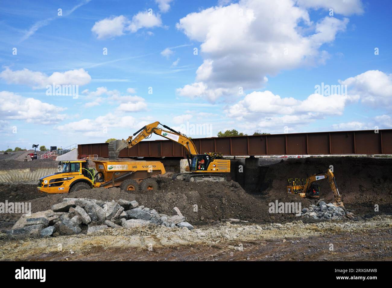 HS2 contractors excavate an area below a newly replaced section of the ...