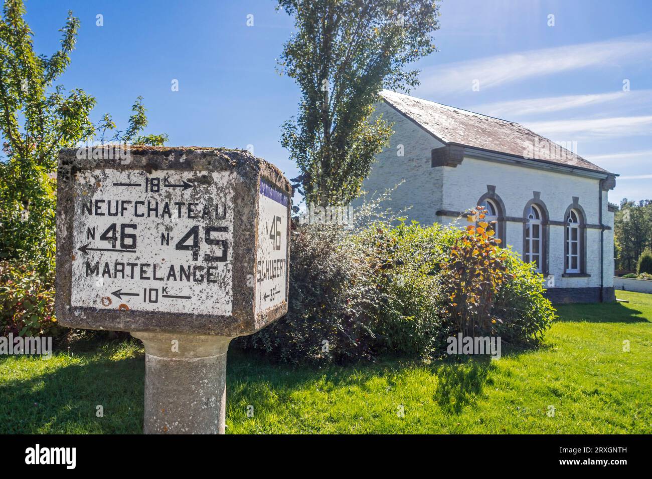 Old road sign / direction sign at open-air museum of Walloon rural life ...