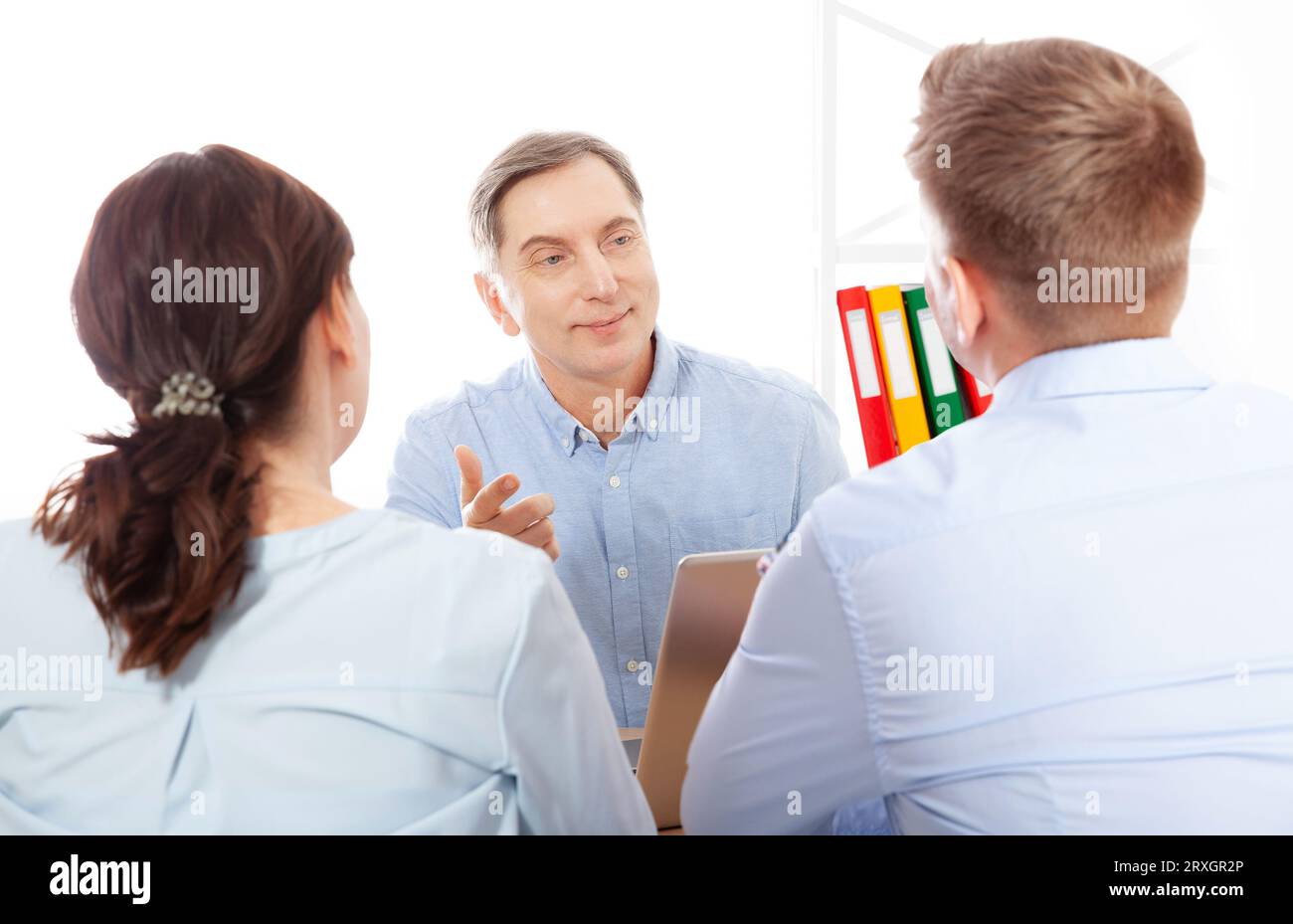 Happy employees working office setting hi-res stock photography and ...