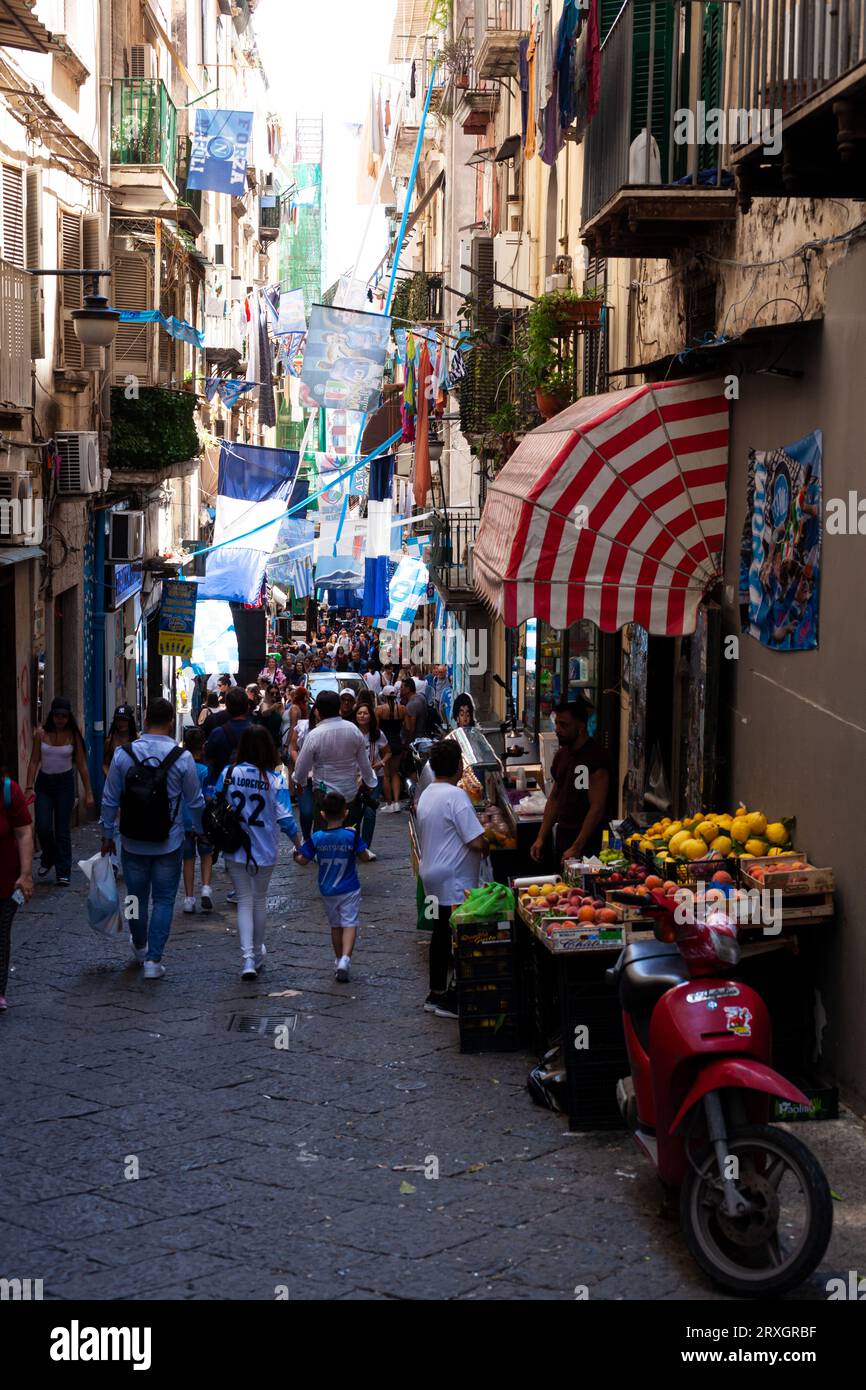Naples, Italy - April 16, 2023: Narrow street in Napoli old town ...