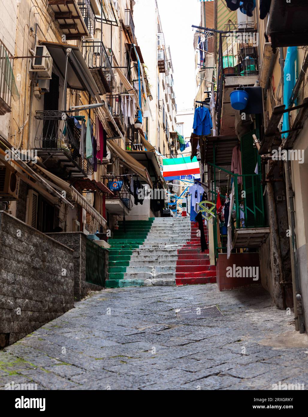 The Spanish Quarters staircase in Naples painted in green, white, and ...