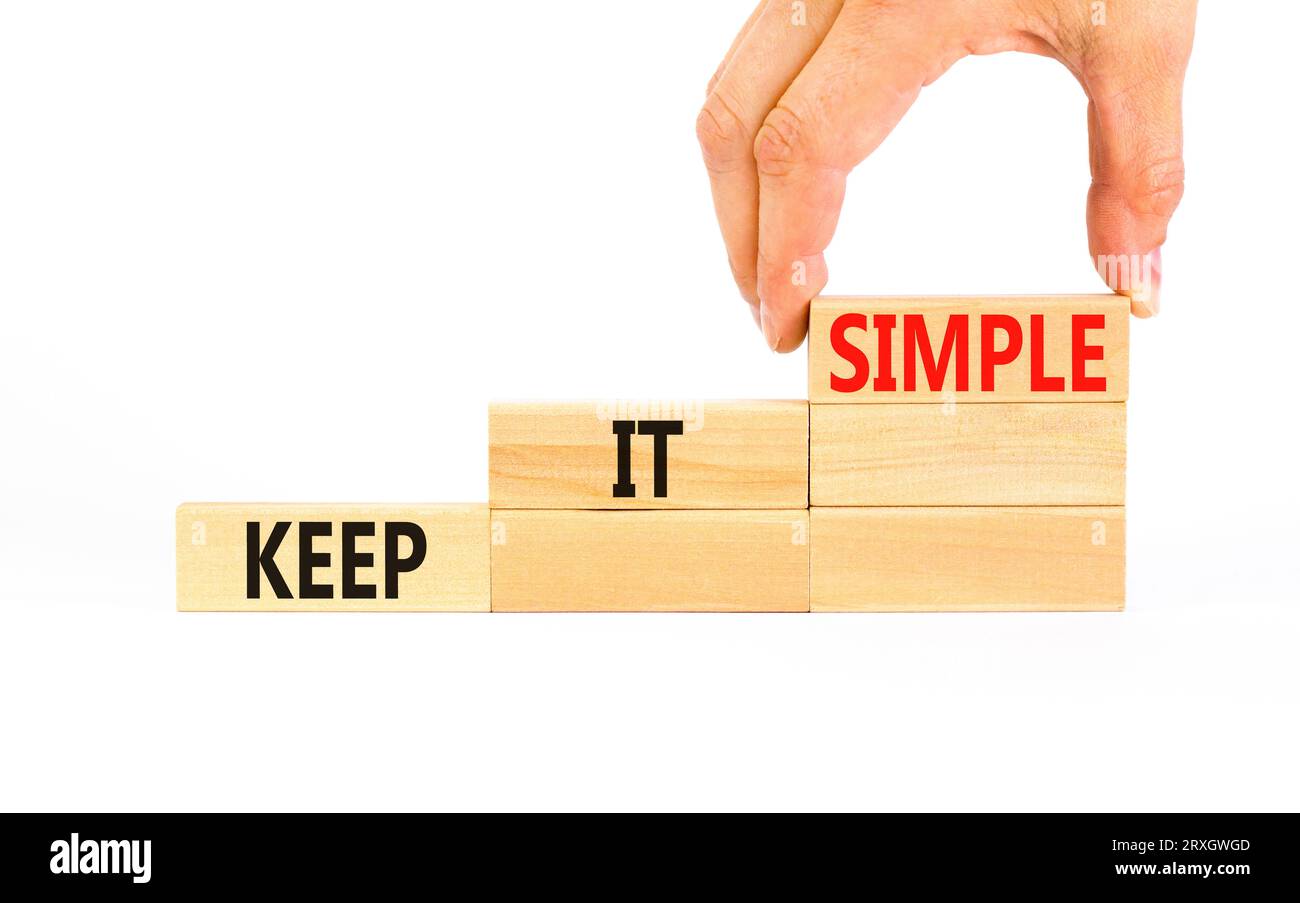 Keep it simple symbol. Concept word Keep it simple on beautiful wooden ...