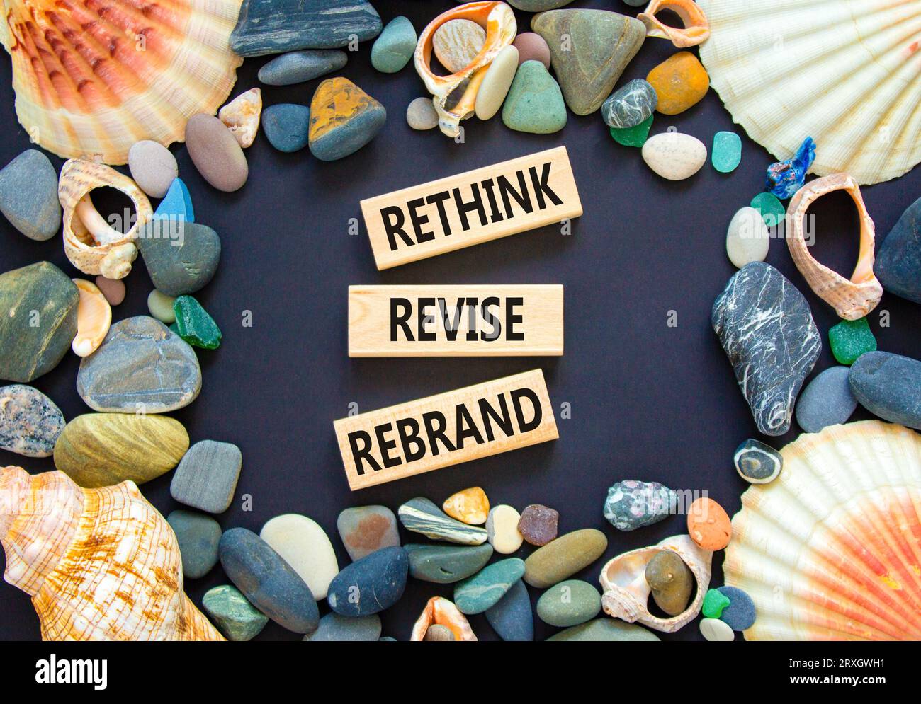 Rethink revise rebrand symbol. Concept word Rethink Revise Rebrand on beautiful block. Beautiful ...