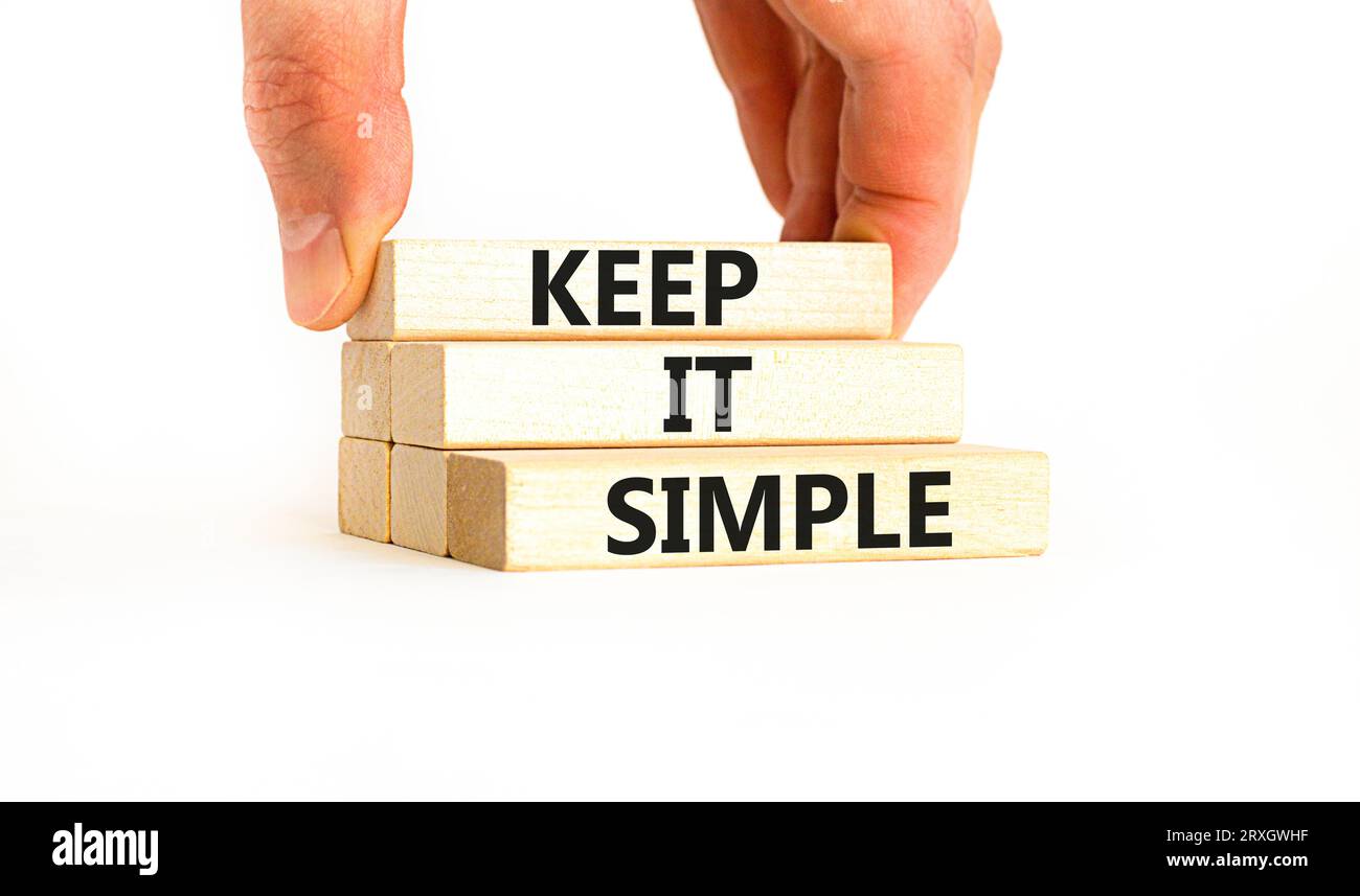 Keep it simple symbol. Concept word Keep it simple on beautiful wooden ...