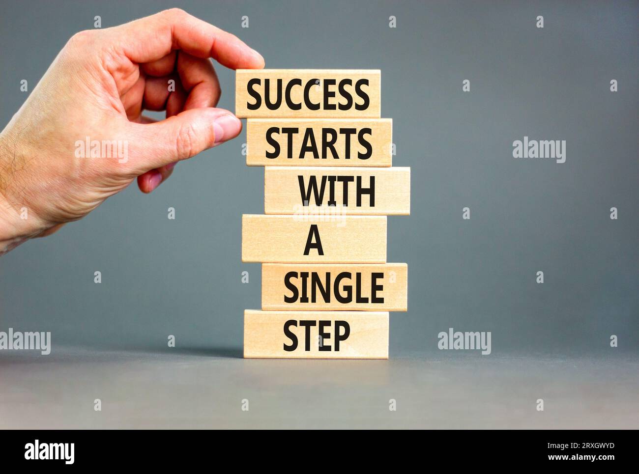 Success symbol. Concept words Success starts with a single step on ...