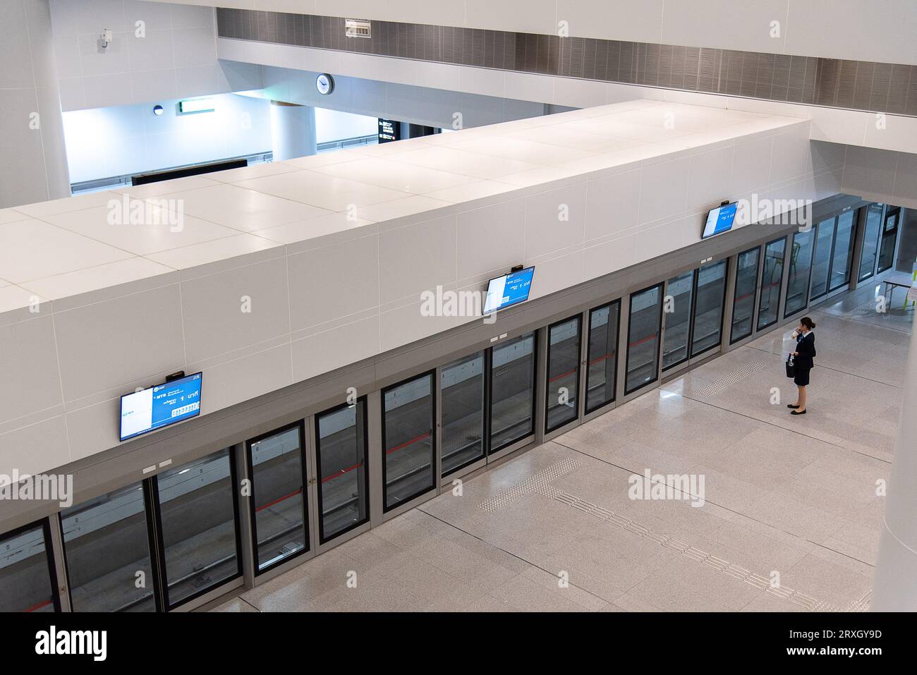Samut Prakarn, Thailand. 25th Sep, 2023. A woman wait for a train at ...