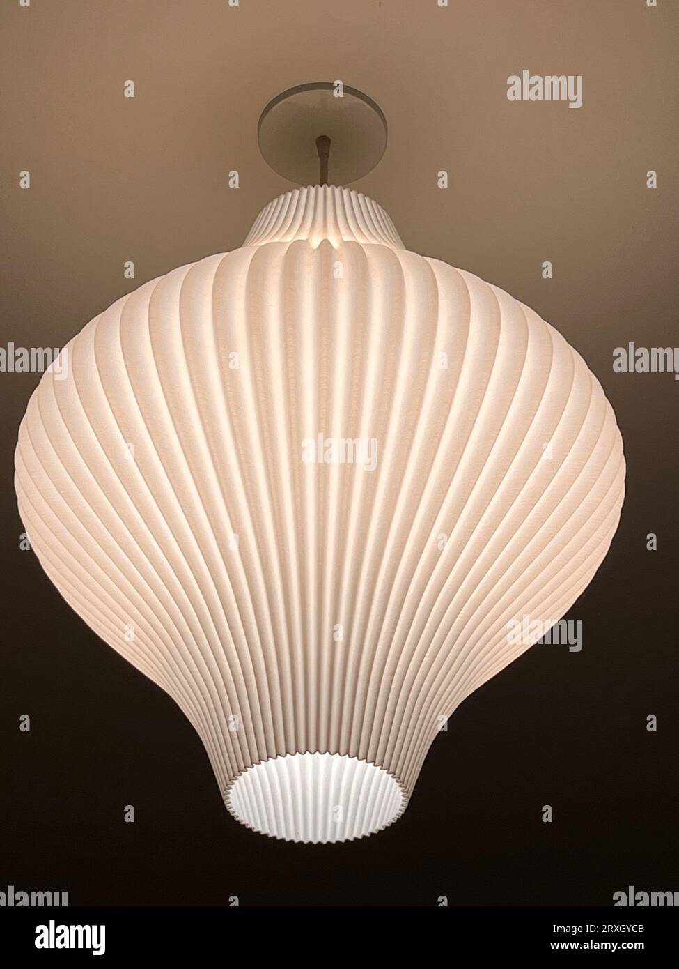 Lighting lamp shaped like folded paper Stock Photo - Alamy