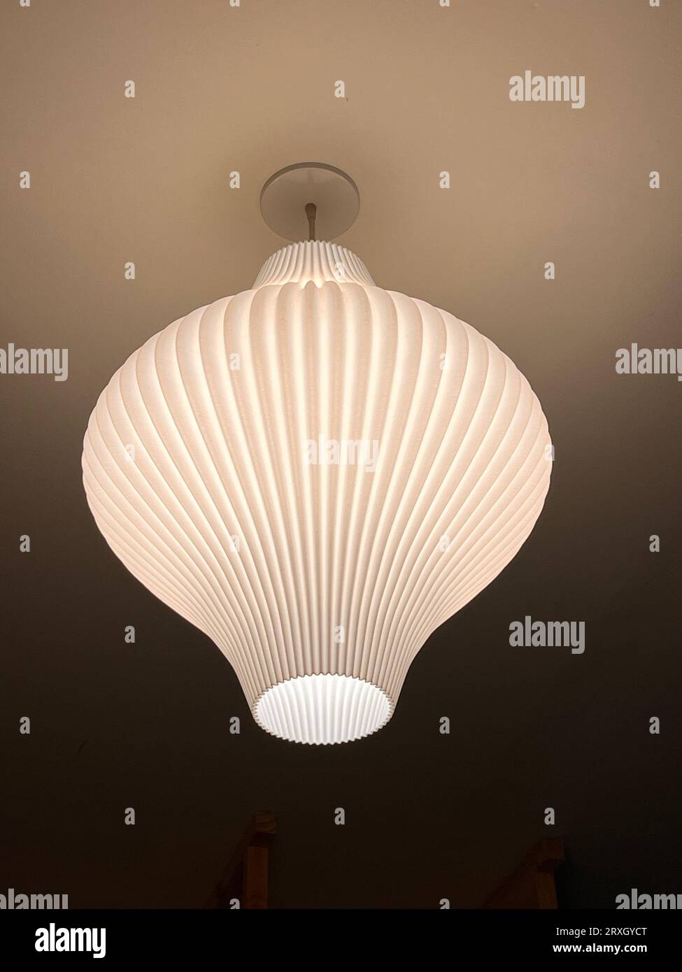 Lighting lamp shaped like folded paper Stock Photo - Alamy