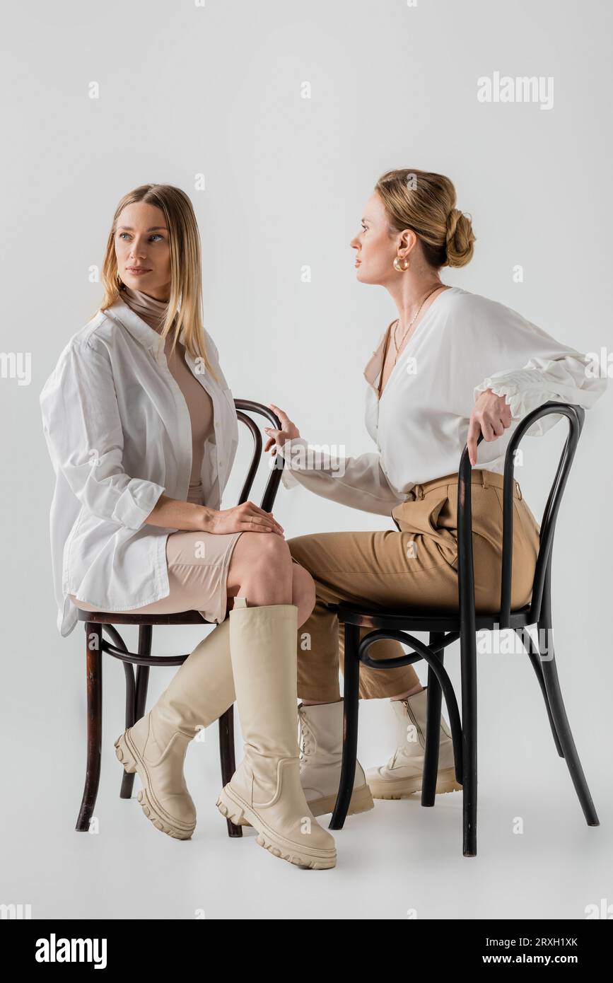 Together in comfortable chairs hi-res stock photography and images - Alamy