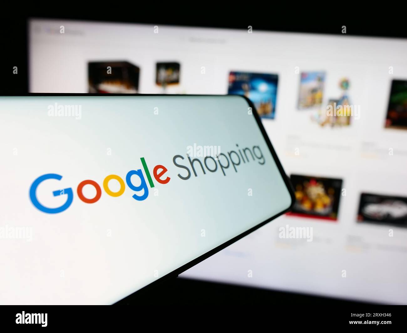 Smartphone with logo of product search platform Google Shopping on ...