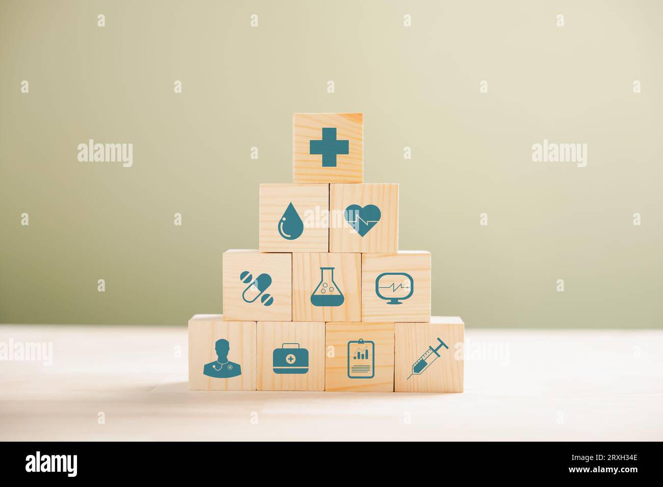 Medical symbols on wooden blocks stacked Stock Photo - Alamy