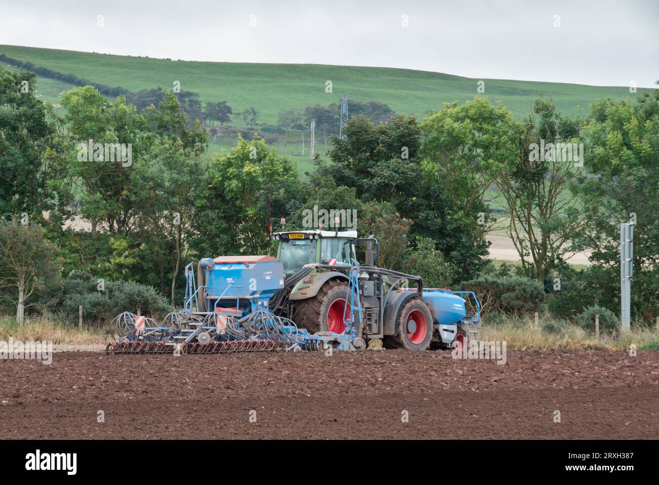 Tractor crop planting and fertilising near Laurancekirk Aberdeenshire ...