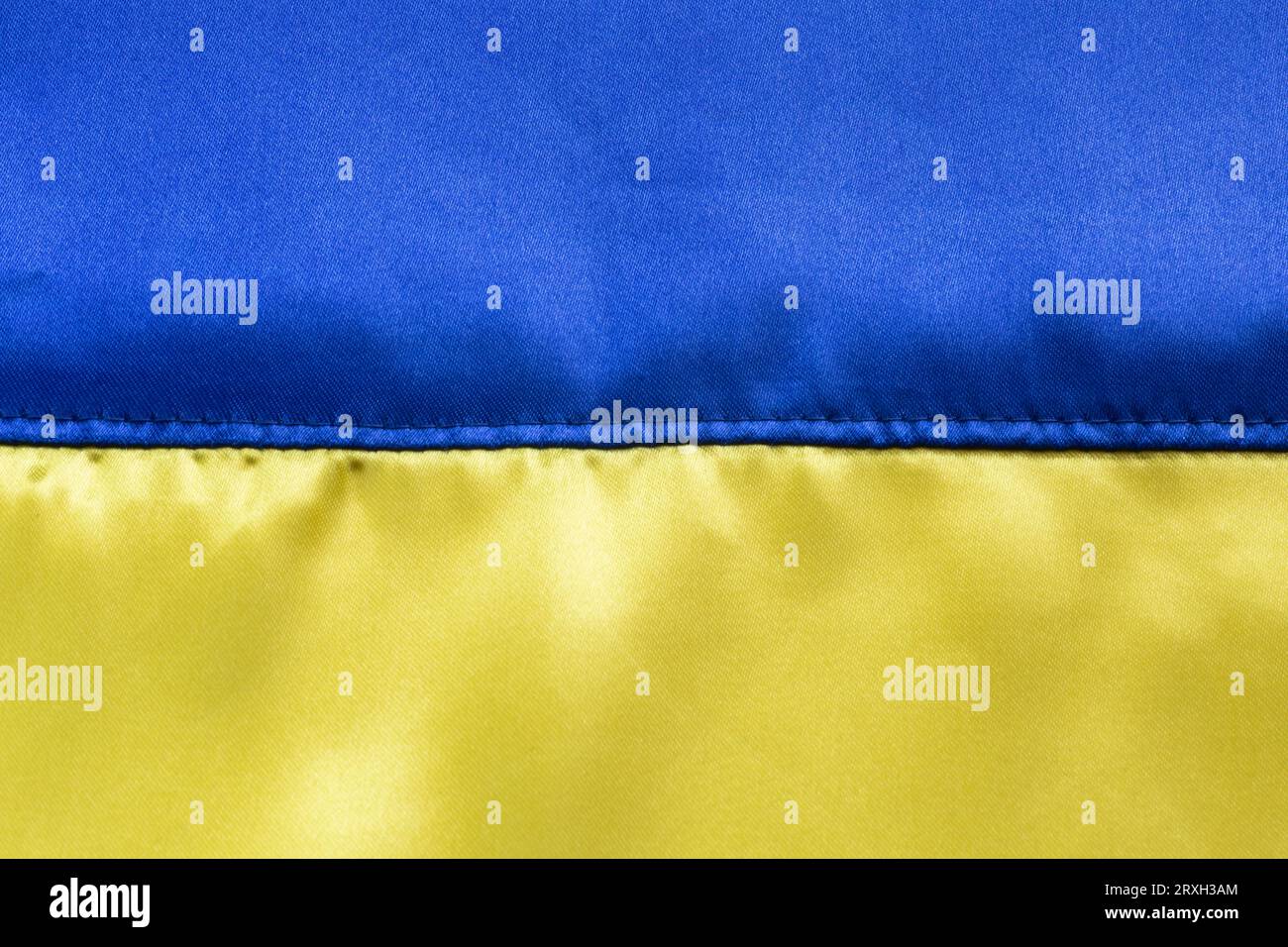 stand with Ukraine: close up of fabric Ukrainian flag Stock Photo - Alamy