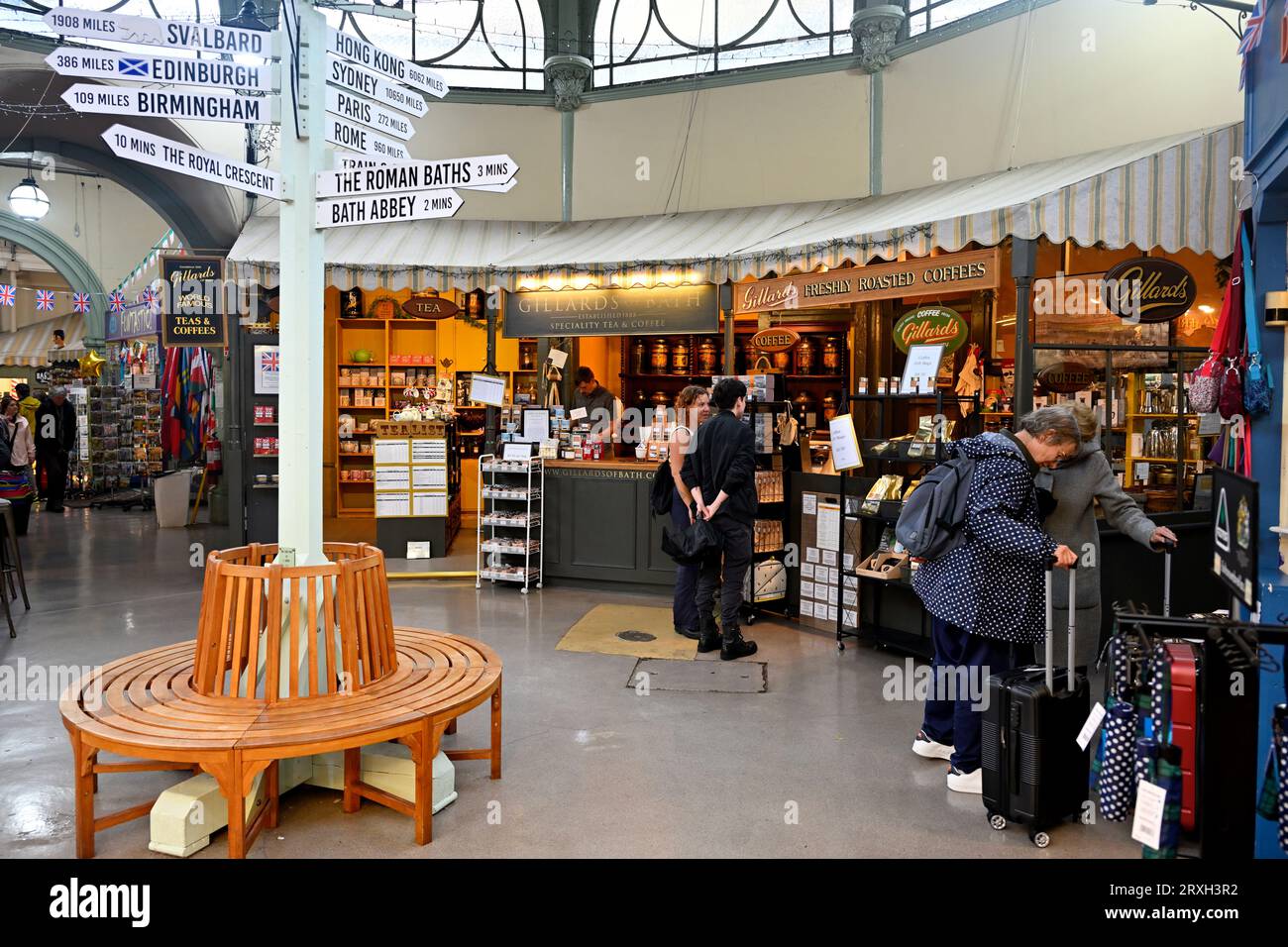 Inside the Bath Guildhall Market with a world distance post, Bath, UK ...