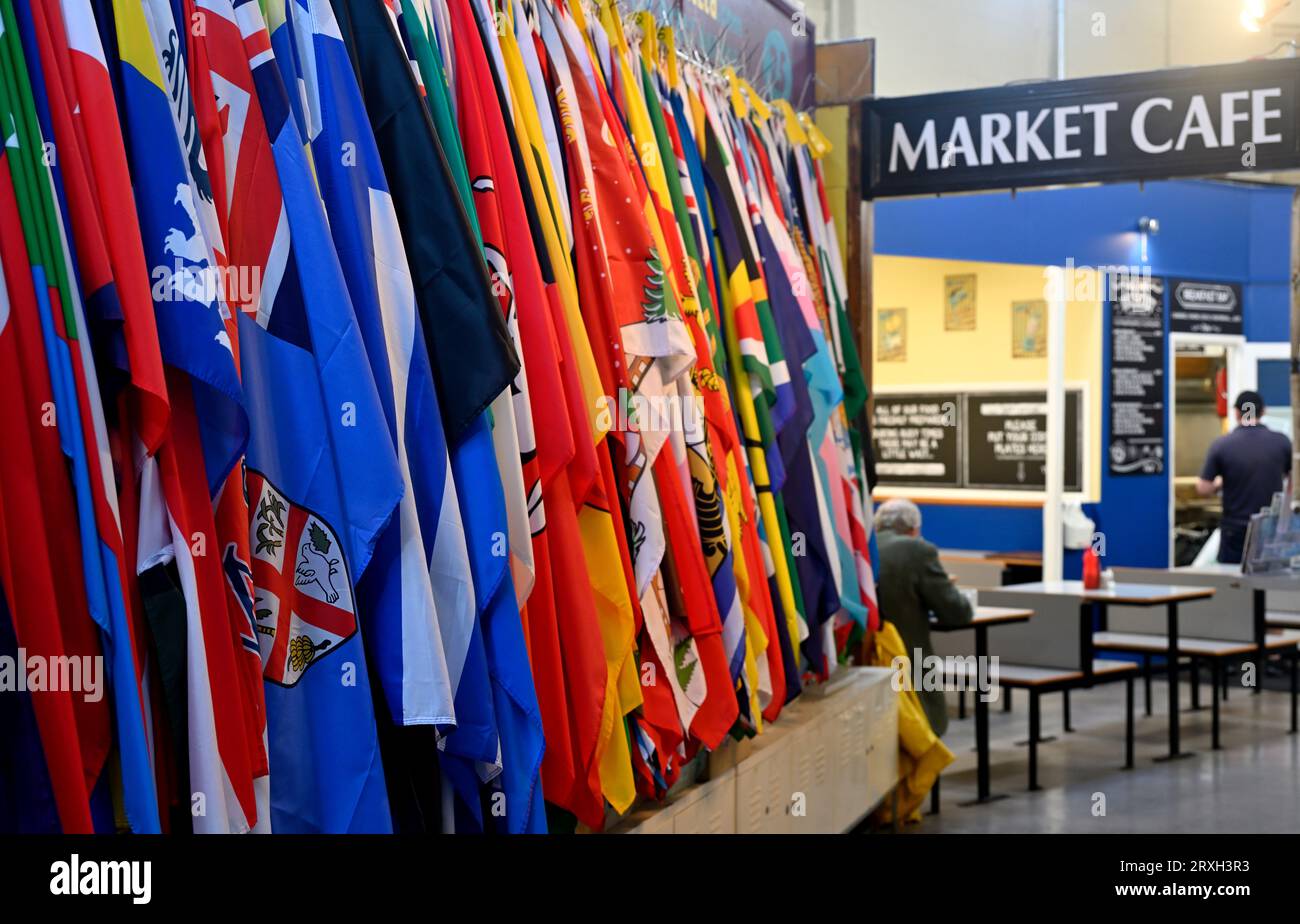 Colourful international and sporting flags at entrance to the Market ...
