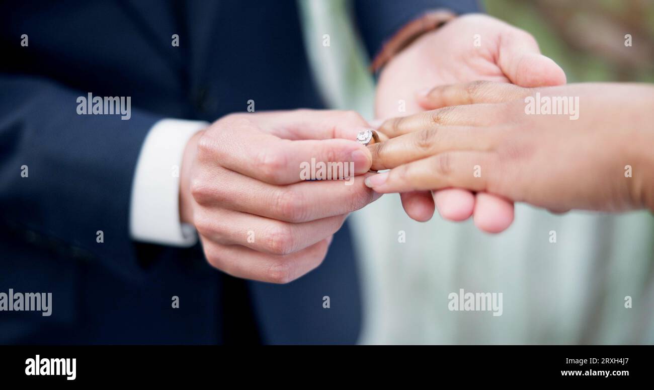Couple, hands and ring for marriage, commitment or wedding in ceremony ...