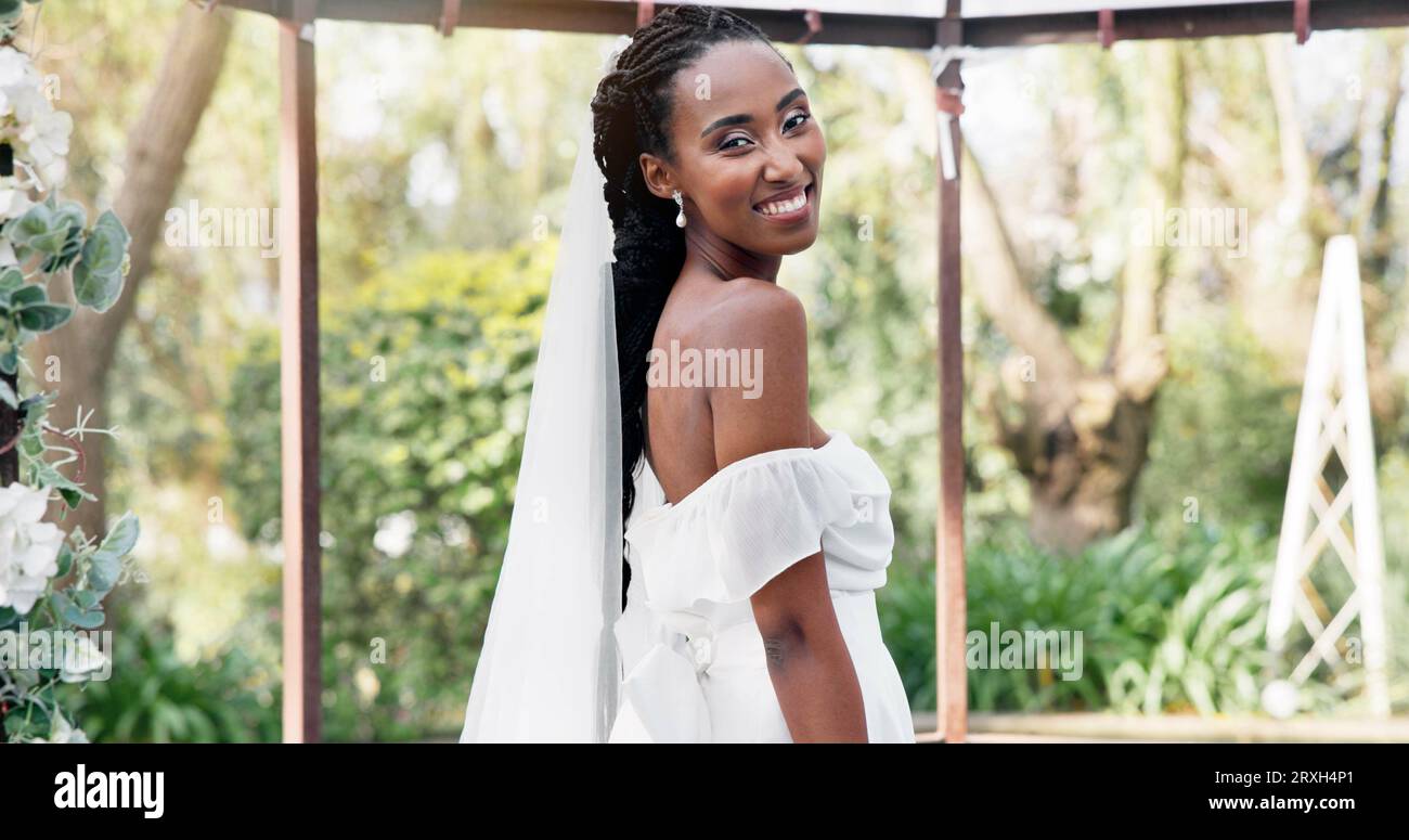 Wedding in garden, bride with smile in gazebo with flowers for ...