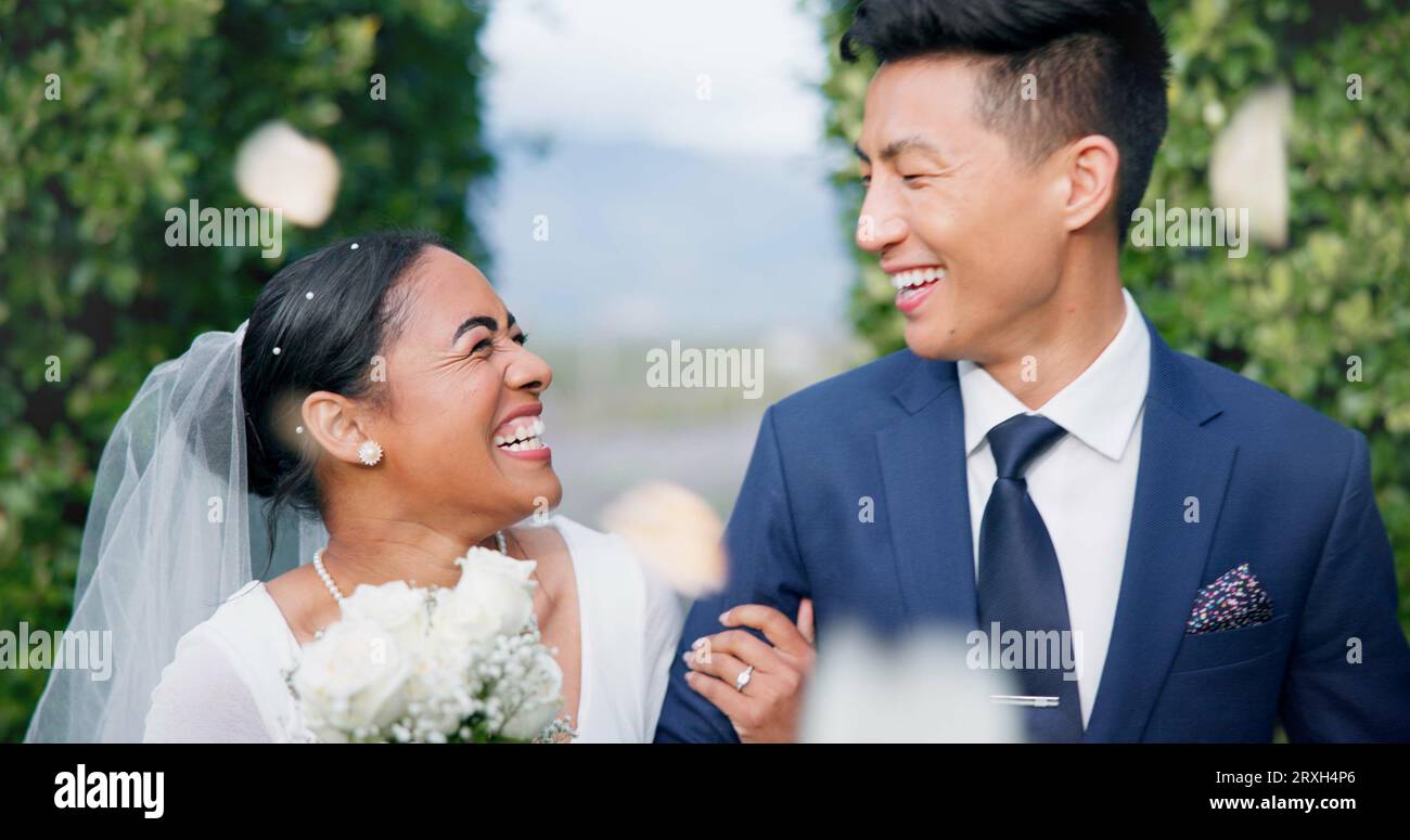 Couple, flower confetti and wedding event with walk, outdoor or happy ...