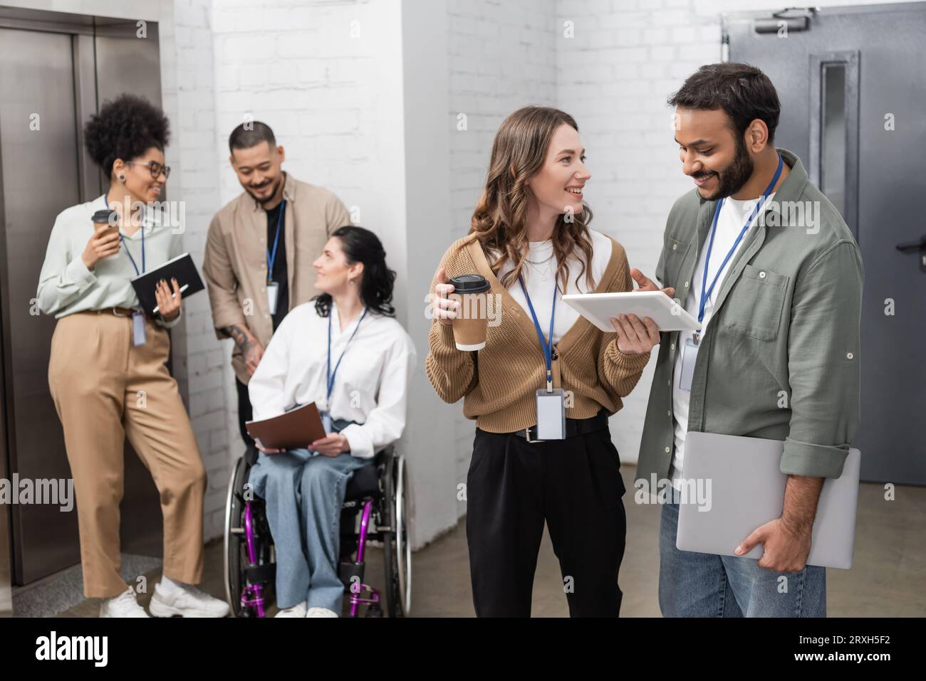 inclusion and diversity, happy multiethnic team standing together near ...