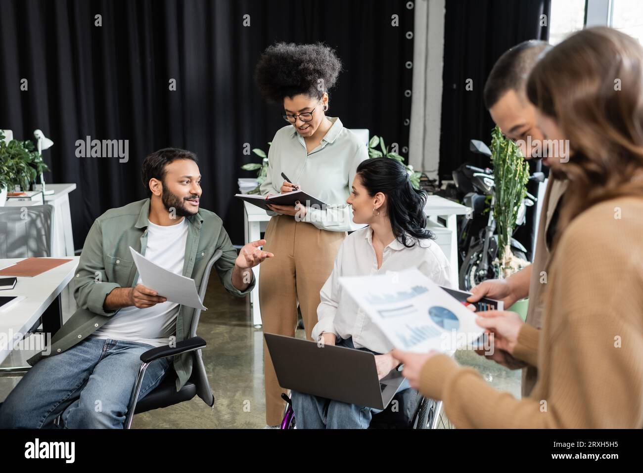diversity and inclusion, happy multiethnic team planning startup project with woman in ...