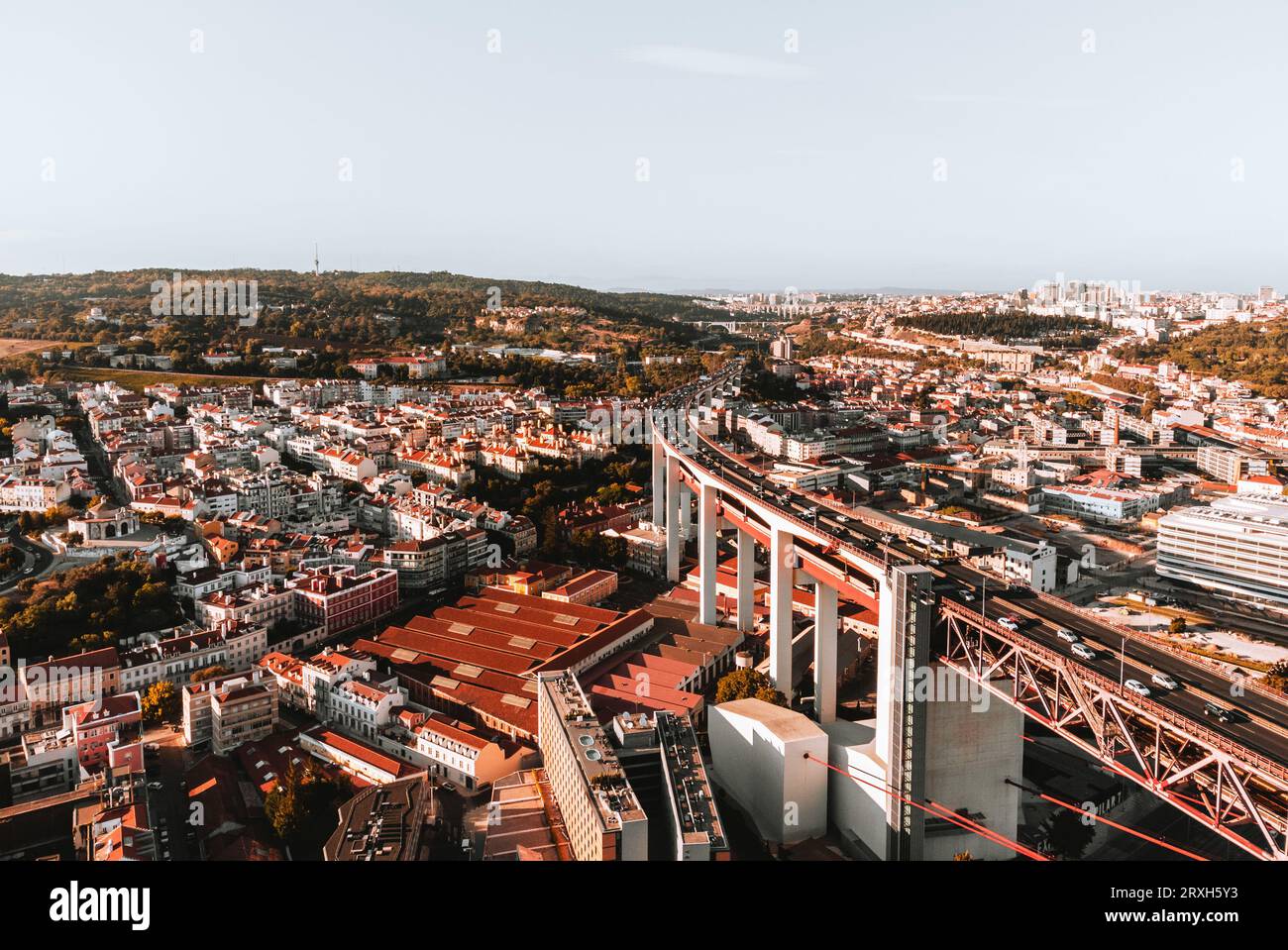 Aerial horizontal photo of streets and buildings of Lisbon on sunset ...