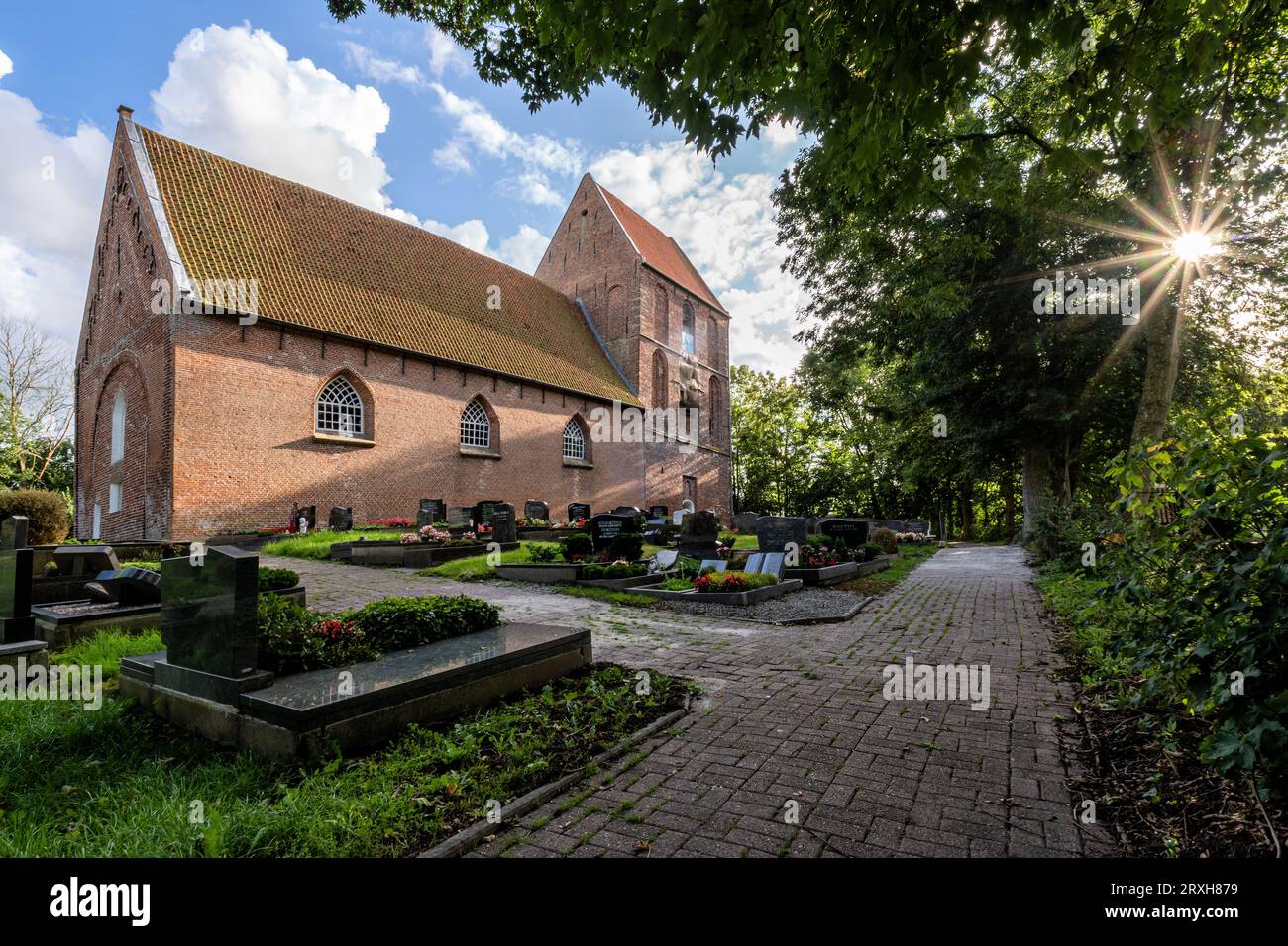 Suurhusen church in Hinte, Germany, with the the most leaning tower of ...
