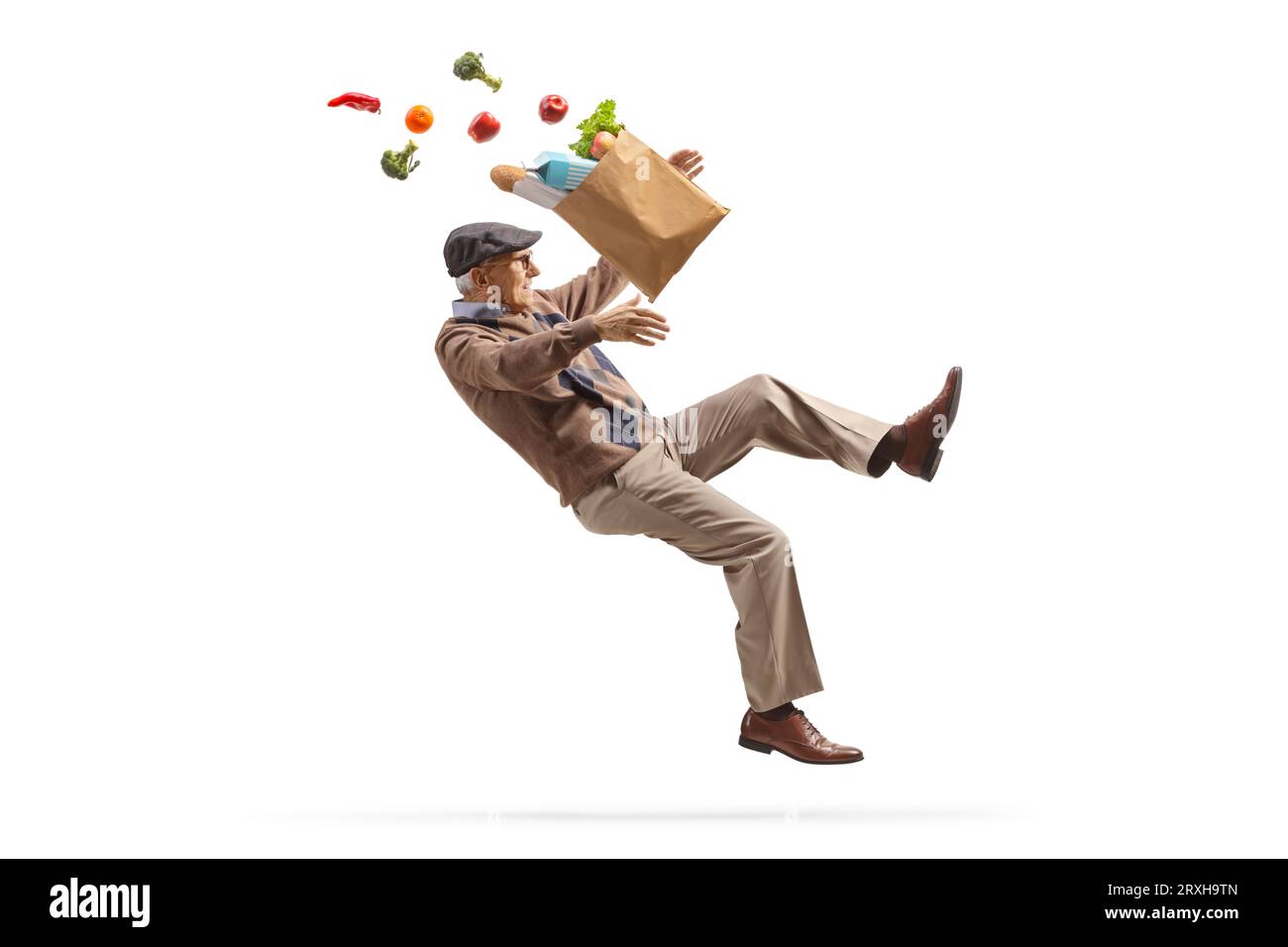 Elderly man with a grocery bag tumbling and falling isolated on white ...
