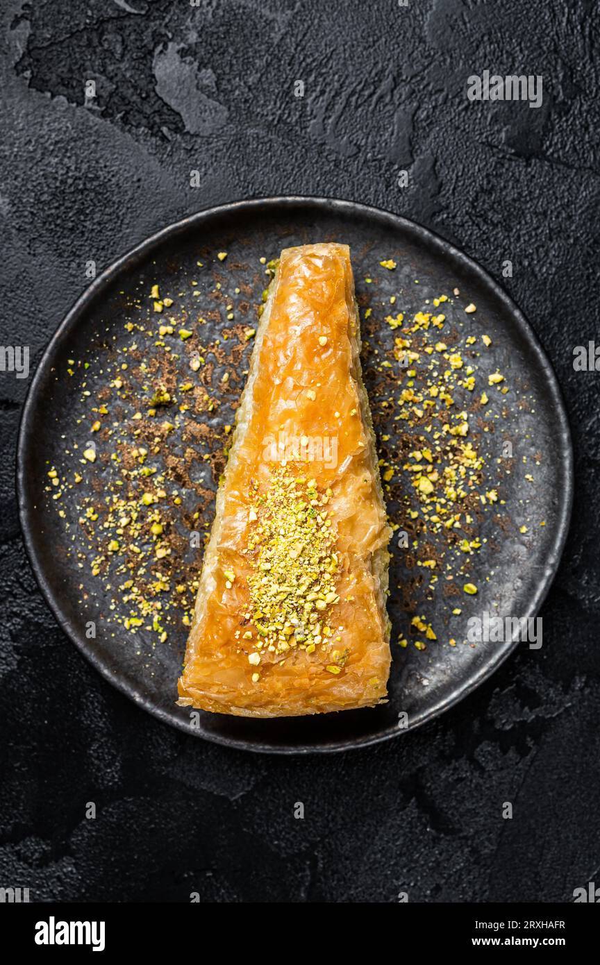 Turkish Havuc Dilim Baklava with pistachio, Carrot Slice Baklava. Black ...