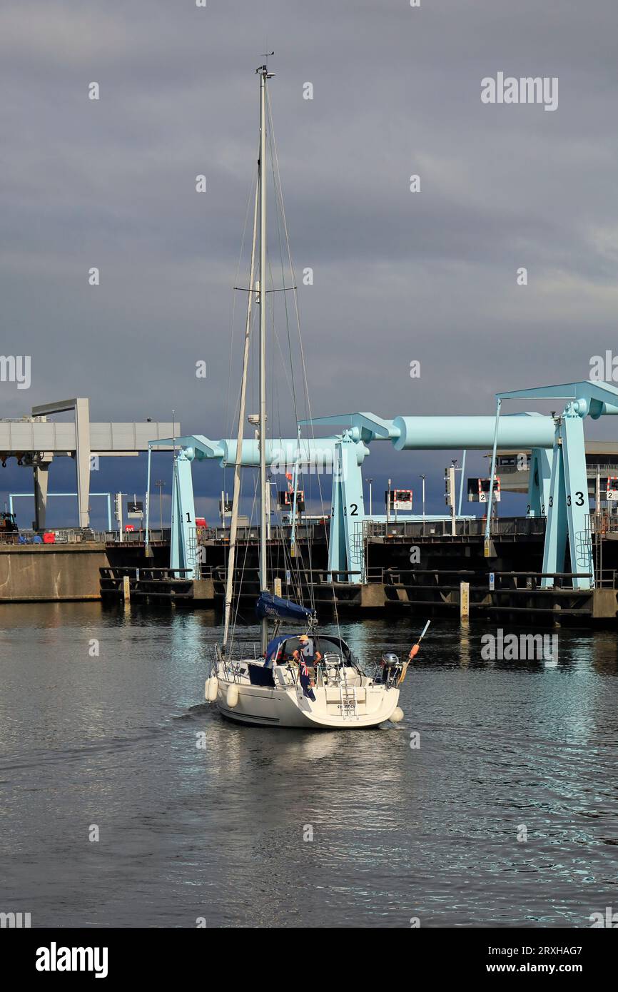 Sailing boat on engine power heading for Cardiff lock gates into ...