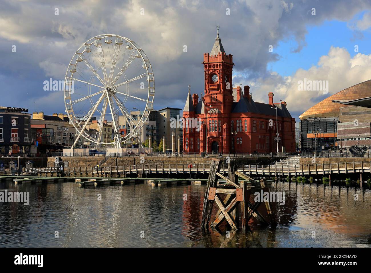 CardiffBay with red brick Pierhead building, ferris wheel and ...