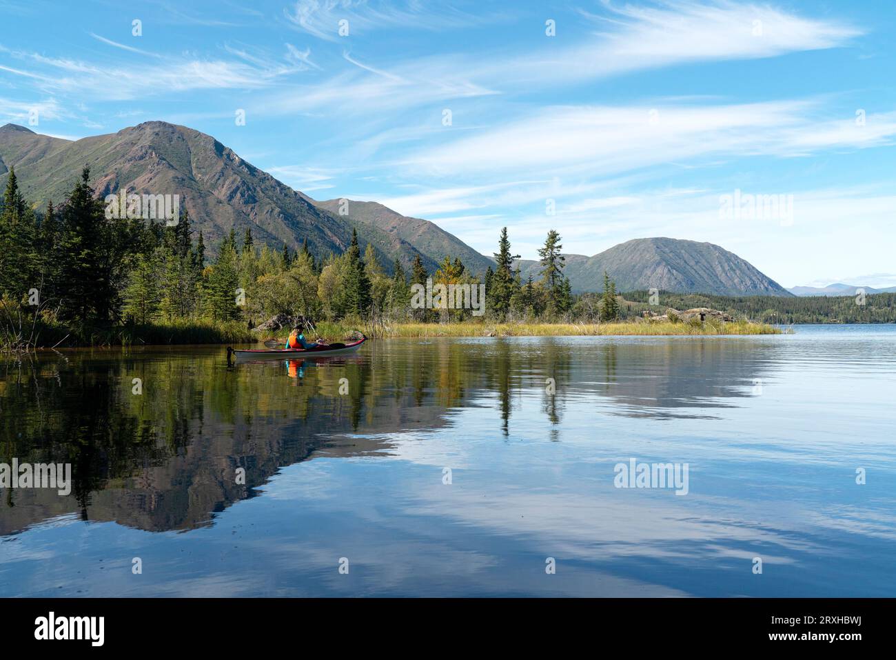 Kayaking on Annie Lake in Canada's Yukon, with beautiful views all ...