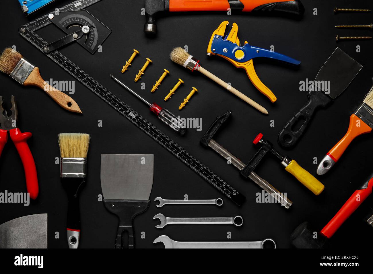 Set of construction tools on black background Stock Photo - Alamy