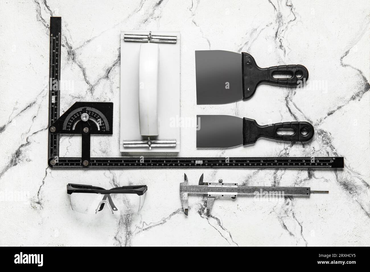 Set of construction tools on white marble background Stock Photo - Alamy