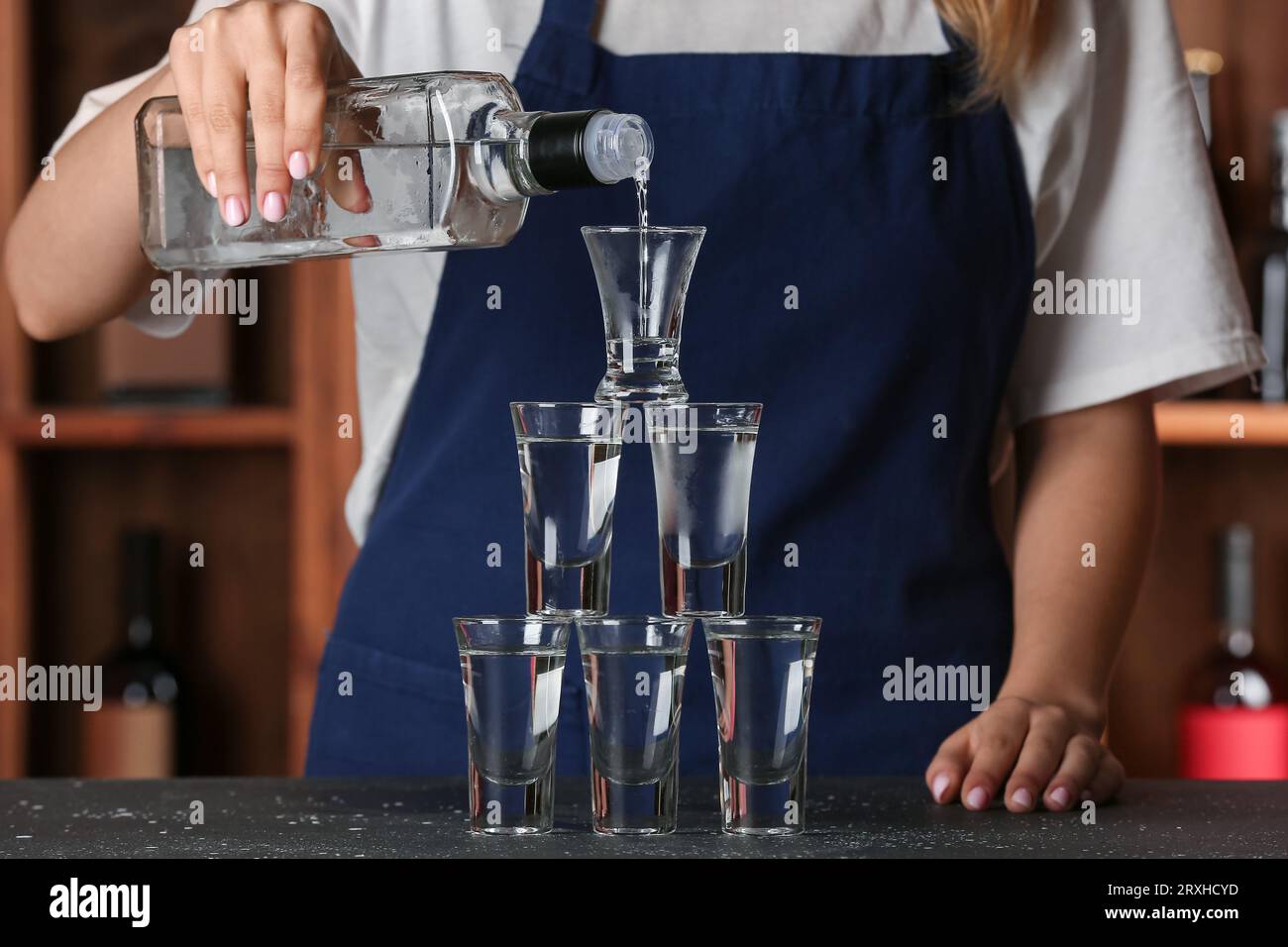 Bartender pouring tasty tequila hi-res stock photography and images - Alamy