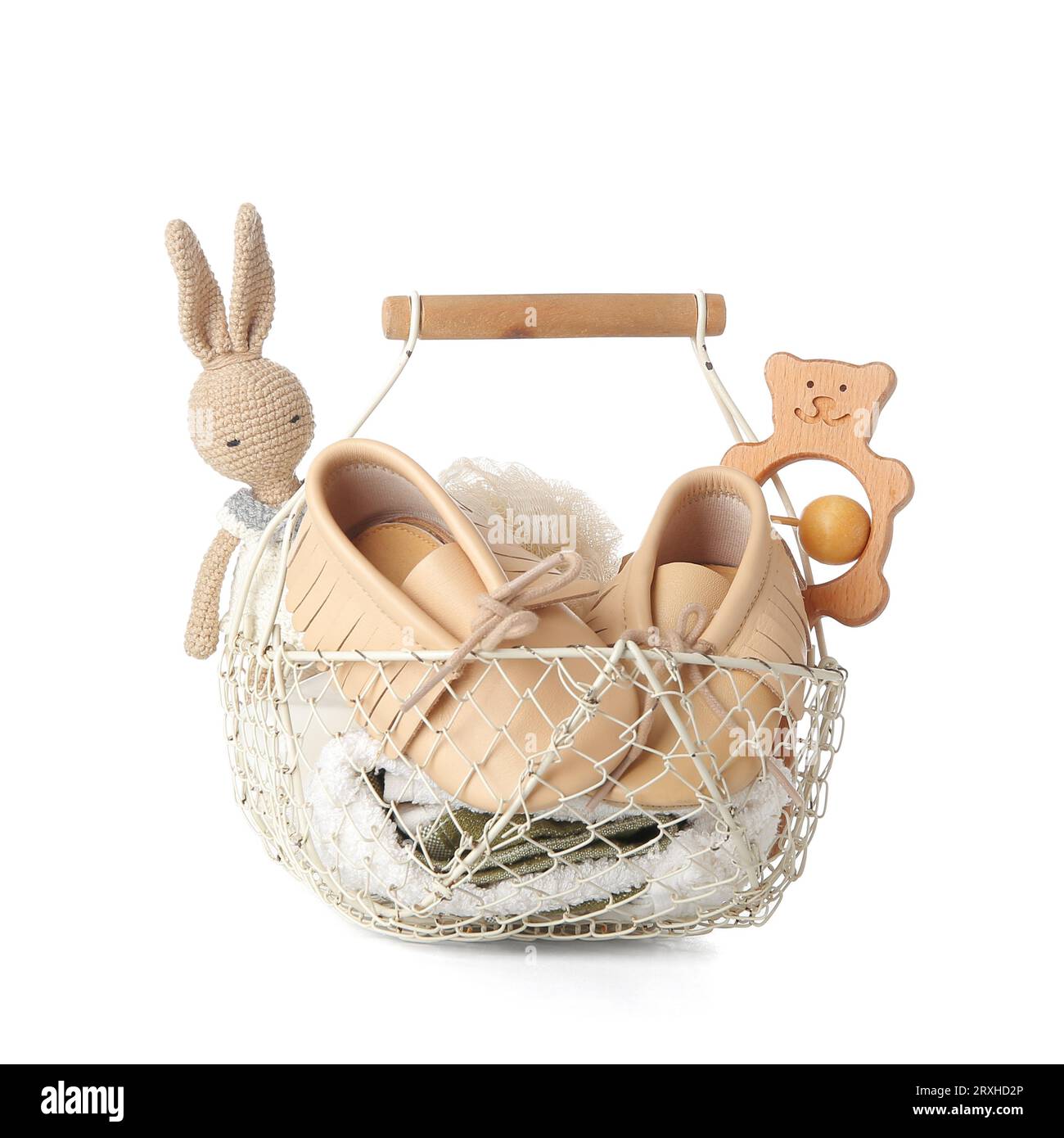 Basket with gifts for baby isolated on white background Stock Photo - Alamy