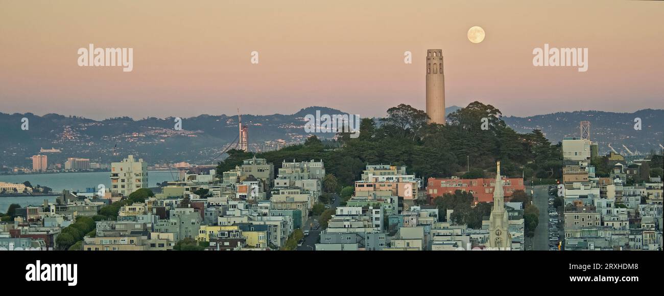 Panoramic of the full moon rise behind the Coit Tower on Telegraph Hill ...