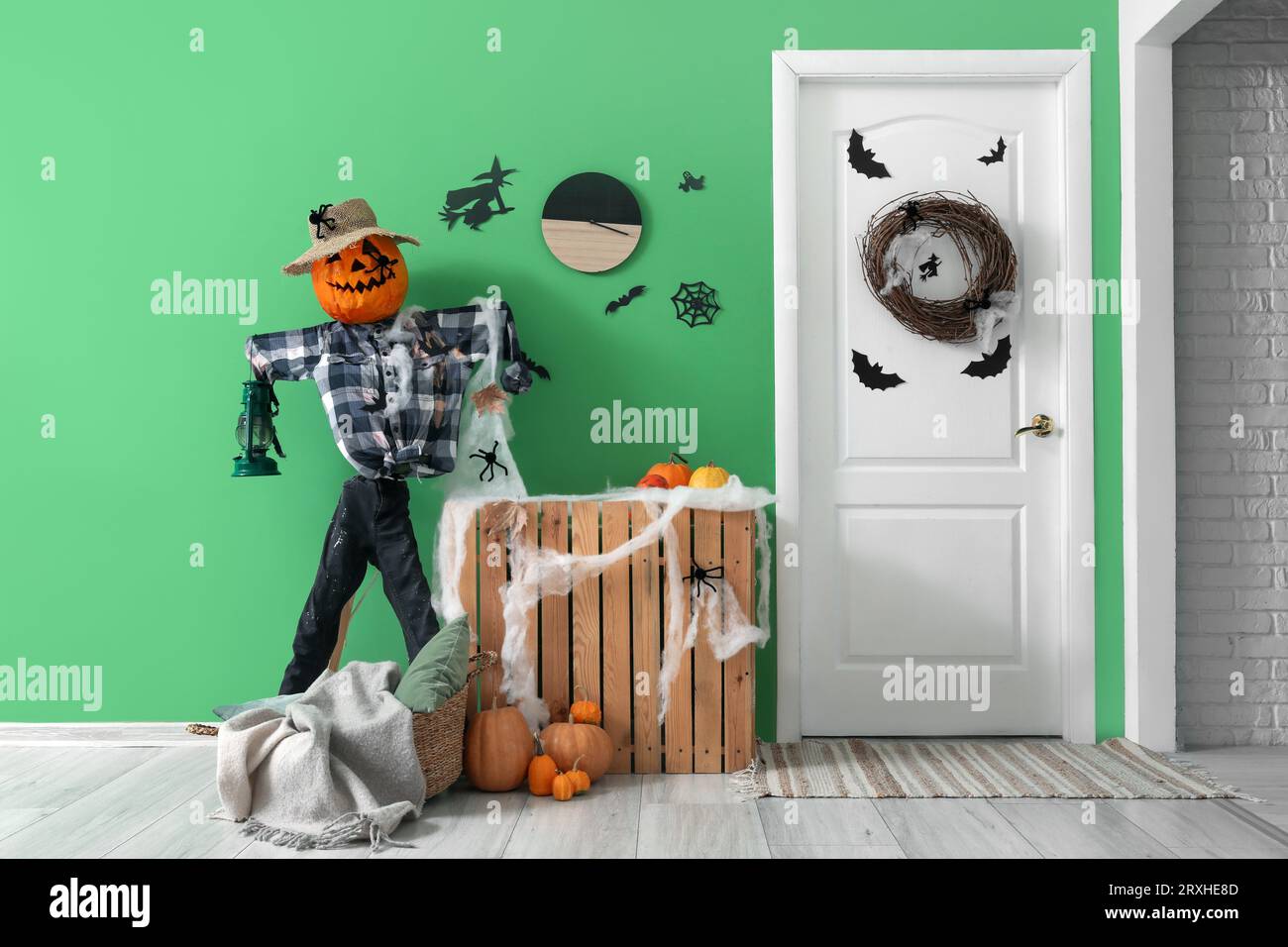 Interior of hall decorated for Halloween with door and scarecrow Stock ...